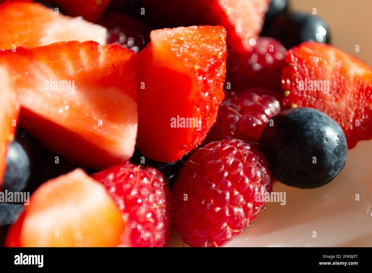 Mix of fresh red fruits, full of healthy vitamins and nutrients Stock ...