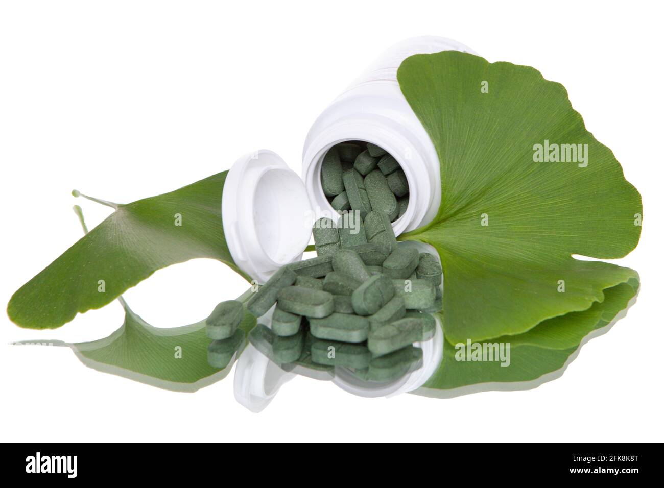Ginko biloba tablets on white background, Isolated Stock Photo - Alamy