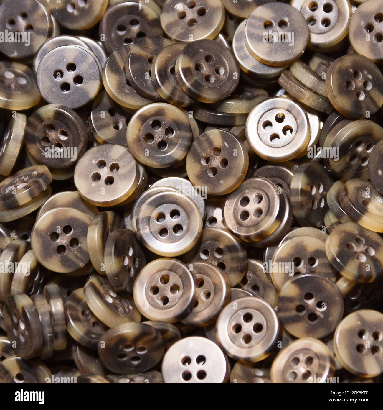Closeup shot of dark and light brown buttons for clothes Stock Photo ...