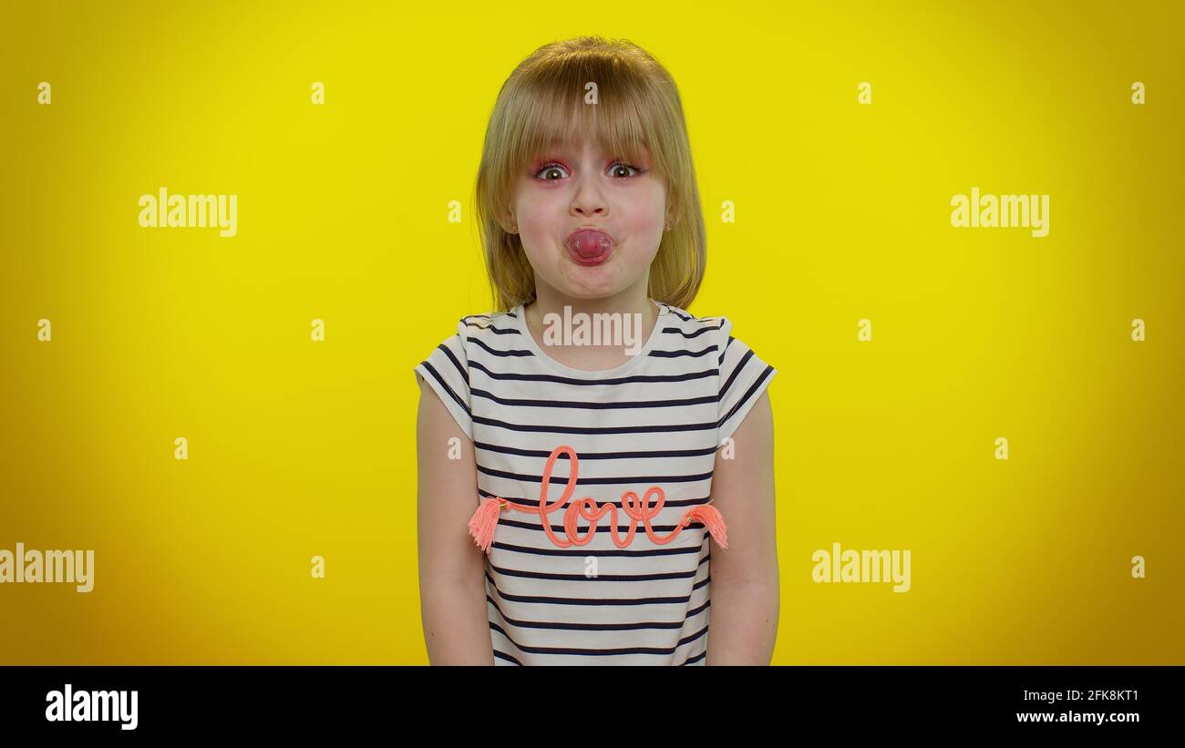 Teen child kid girl making funny silly facial expressions and grimacing ...