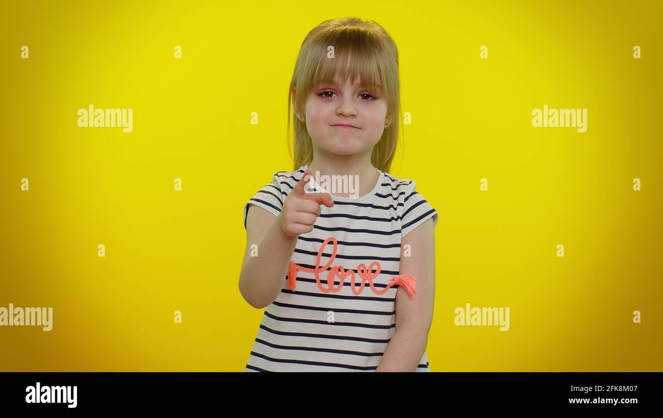 Kid child shakes finger and saying no, be careful, scolding, giving ...