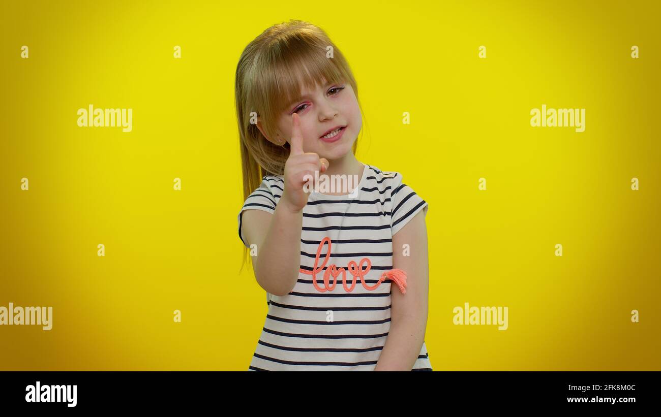 Kid child shakes finger and saying no, be careful, scolding, giving ...