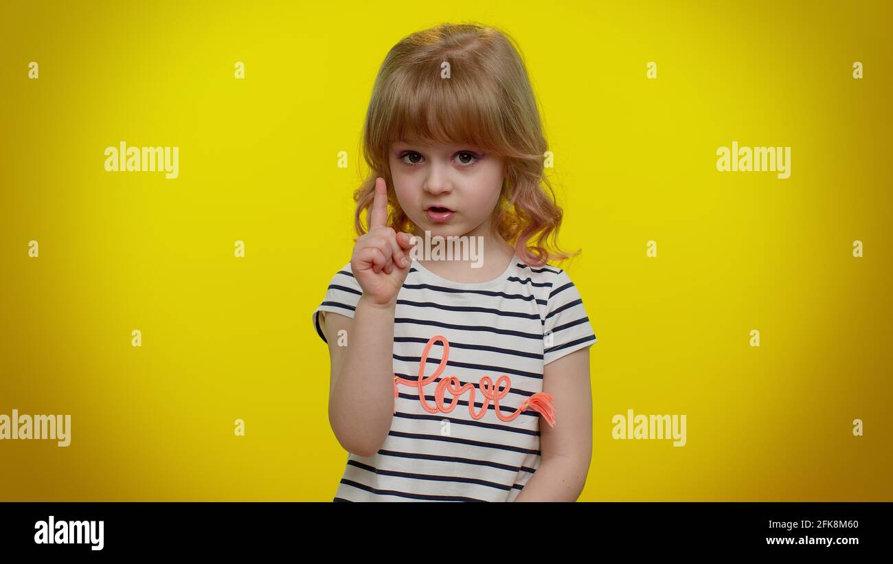 Kid child girl warning with admonishing finger gesture sign, saying no ...