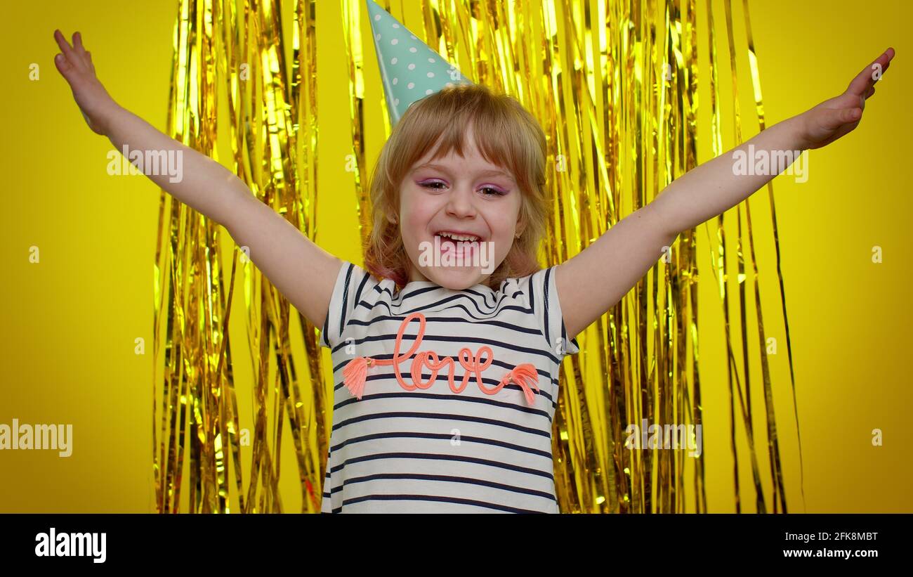 Excited kid child girl winning prize, celebrate birthday, rejoices ...