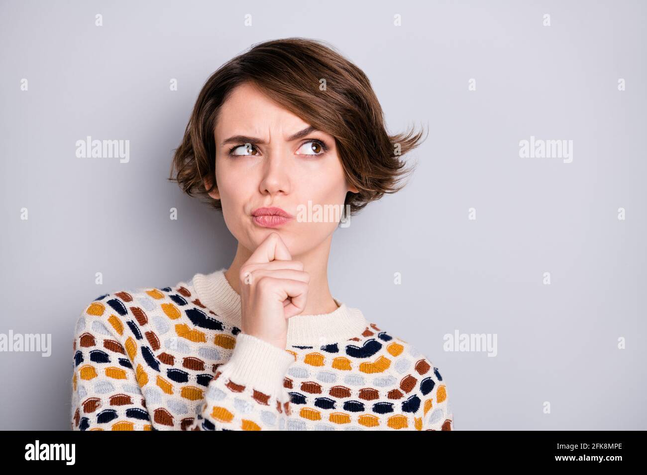 Portrait of lovely minded suspicious brown-haired girl overthinking ...