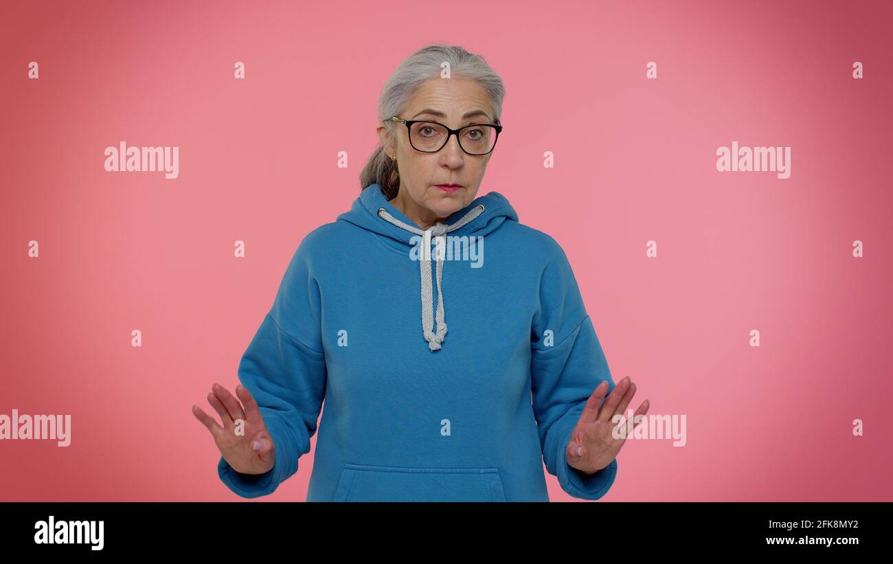 Displeased unpleasant upset senior grandmother wave hand, shake head ...