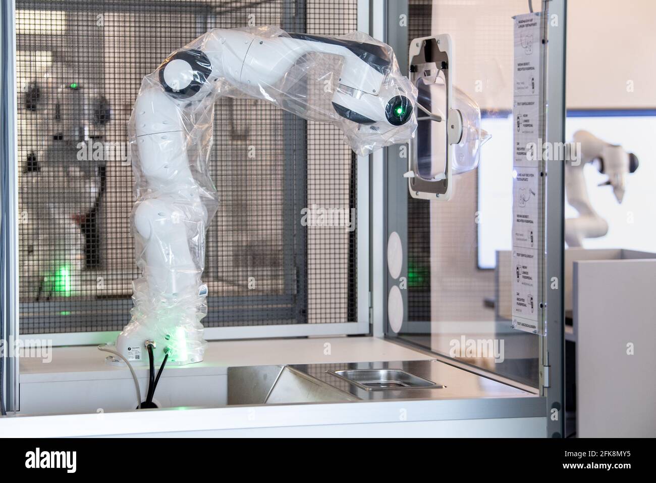 Munich, Germany. 29th Apr, 2021. A robot for automated corona swabs is ...