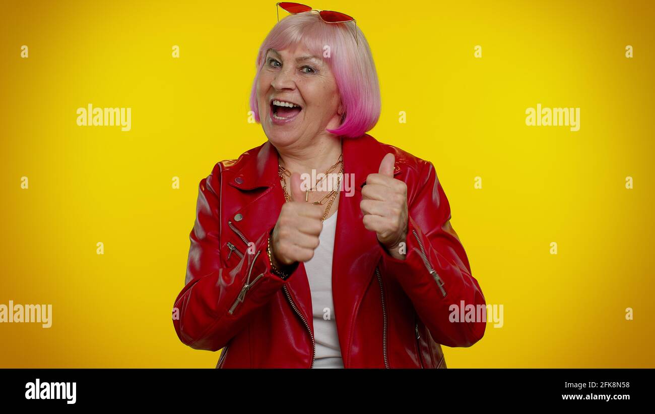 Elderly old woman granny celebrate success win scream rejoices doing ...