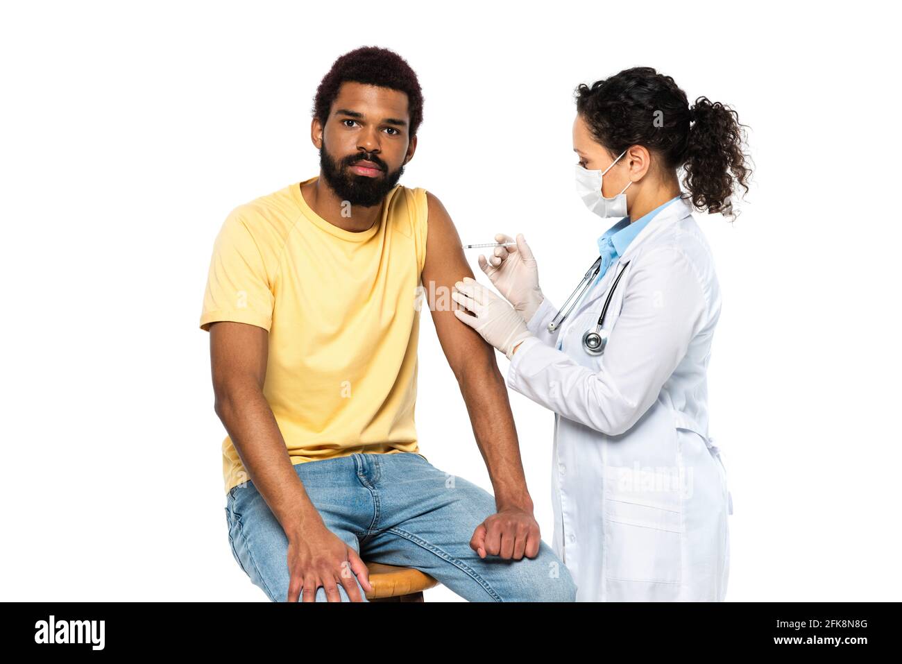 African american doctor doing injection with vaccine to patient ...