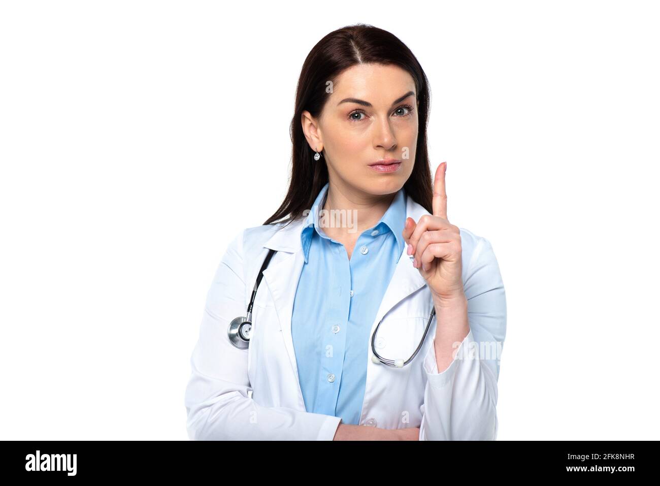 Brunette doctor having idea isolated on white Stock Photo - Alamy