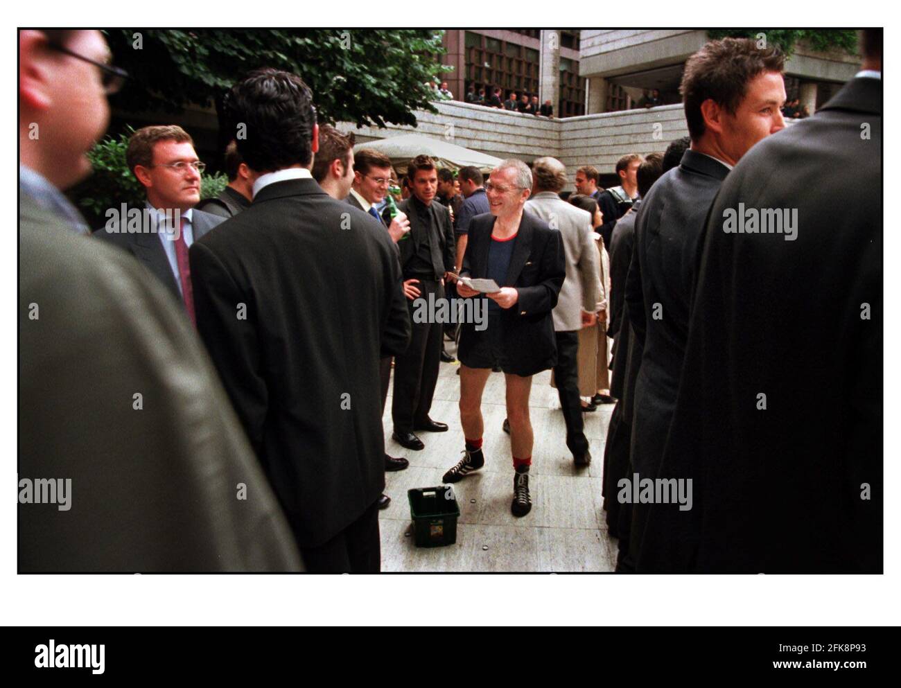 Awaiting his big moment in the boxing ring, Roger Moore (55) July 2000a ...