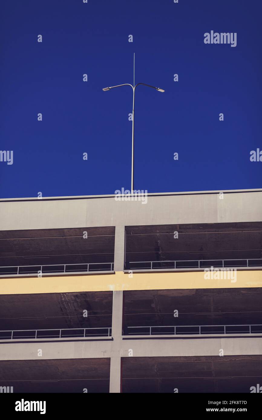 Urban parking spot with a modern parking space Stock Photo - Alamy