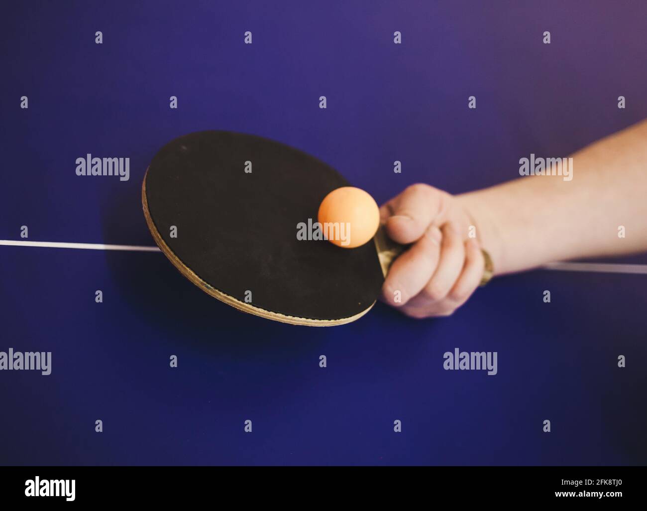 hand with a table tennis racket and a ball. serve in ping pong Stock ...