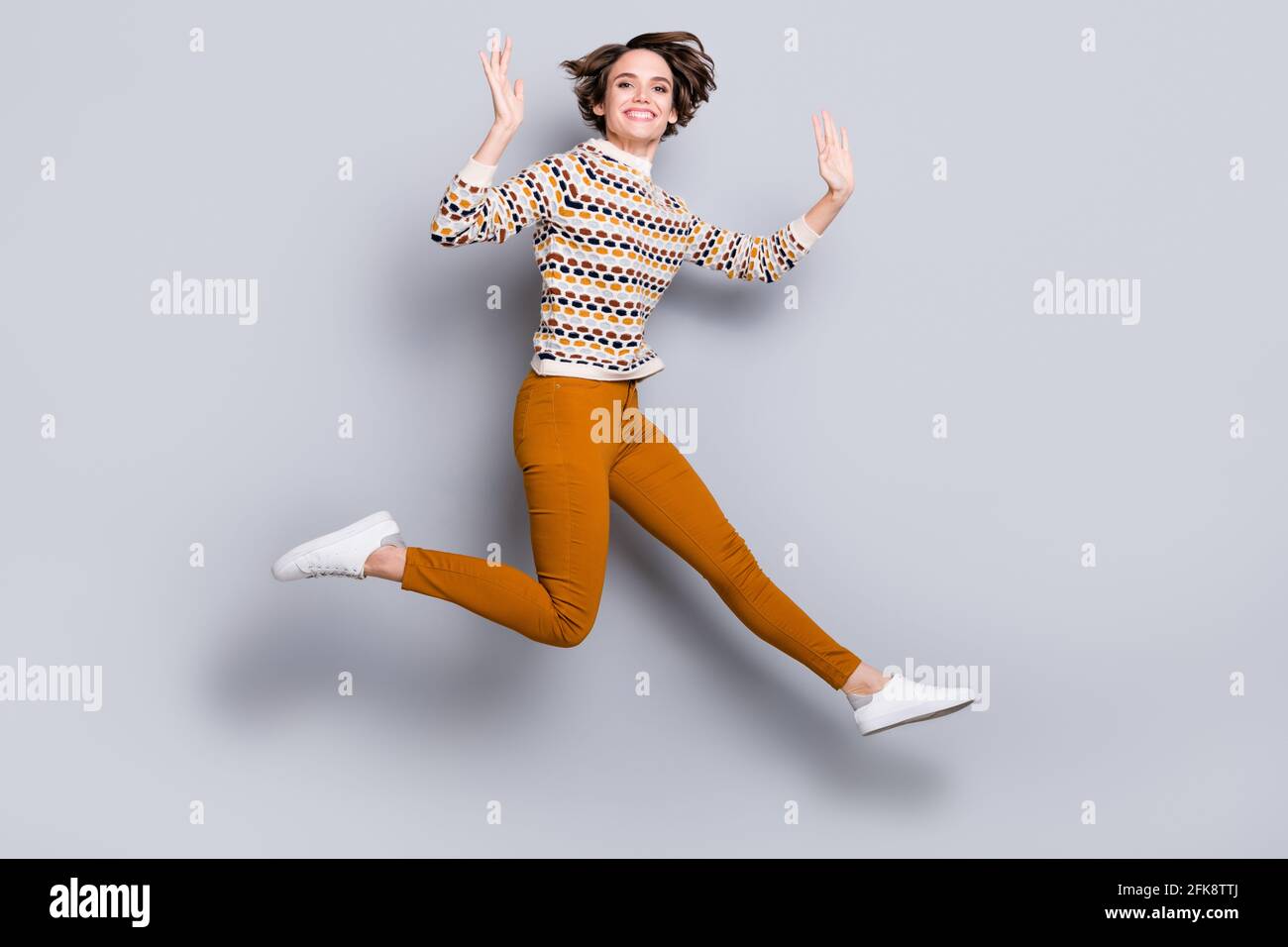 Full length body size view of attractive thin cheerful girl jumping ...