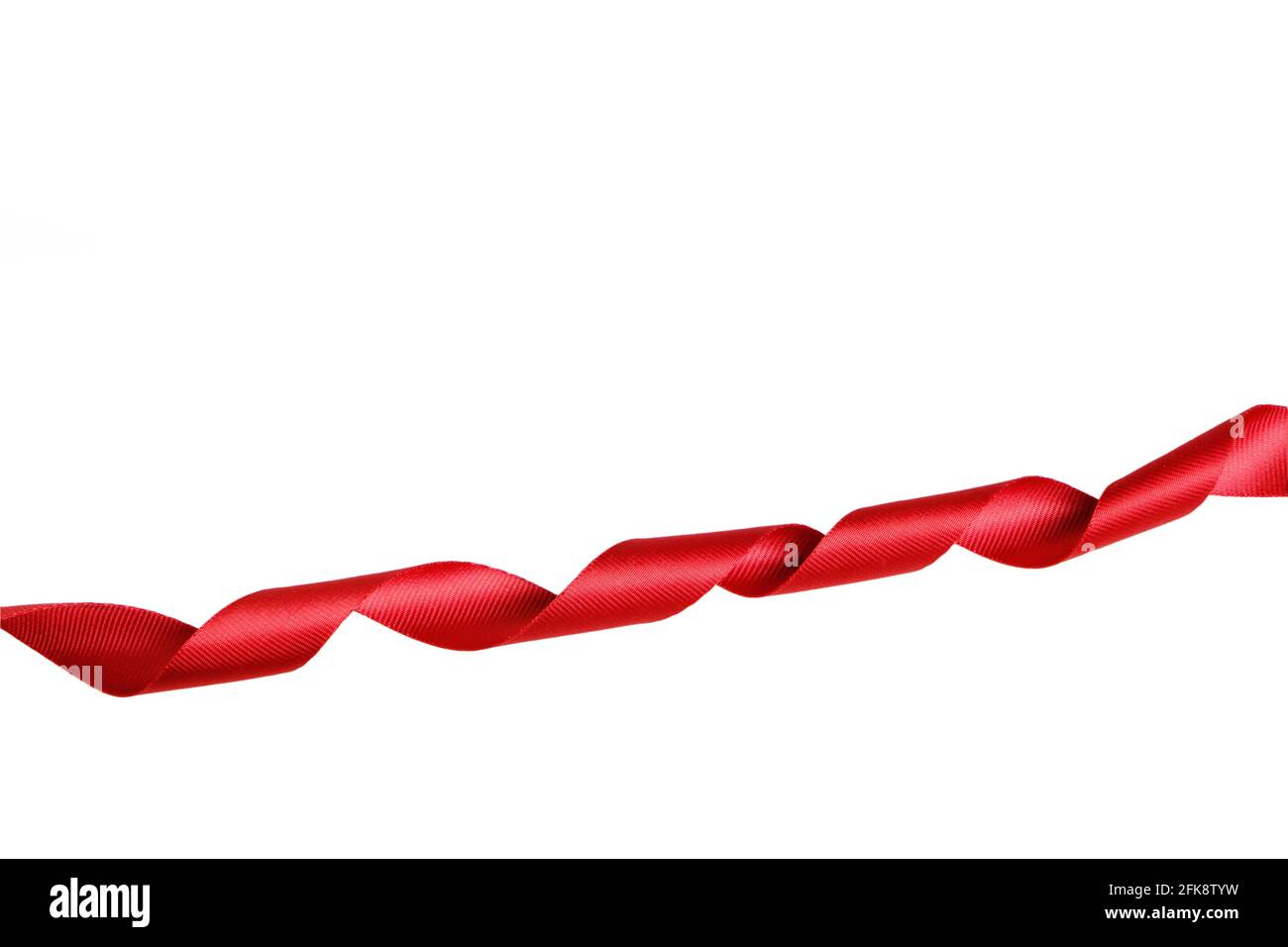 Red ribbon twisted in a spiral on a white background Stock Photo - Alamy