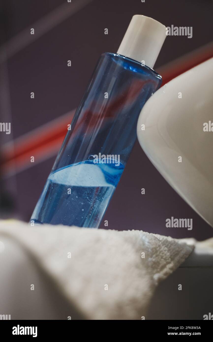 Liquid detergent in plastic bottle. Blue color liquid soap Stock Photo ...