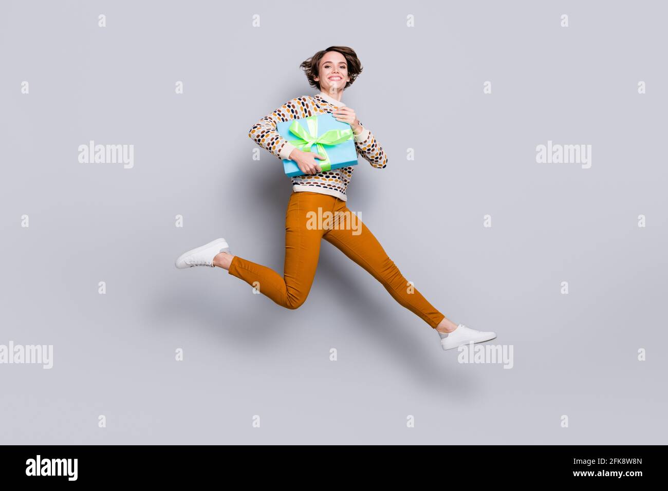 Full length body size view of lovely cheerful girl jumping running ...