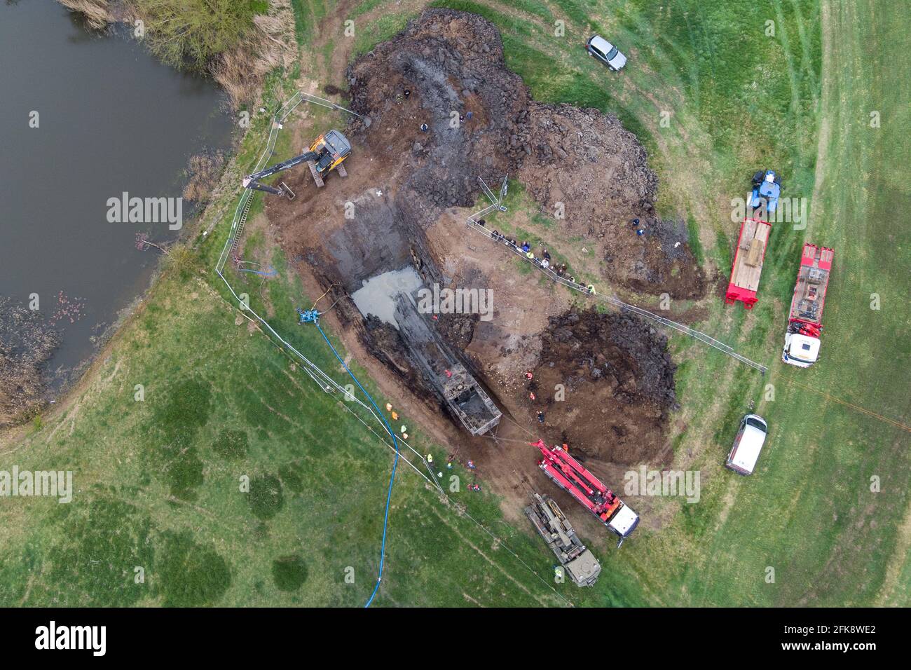 A 26-foot-long Buffalo tank is extracted from the earth in Crowland ...