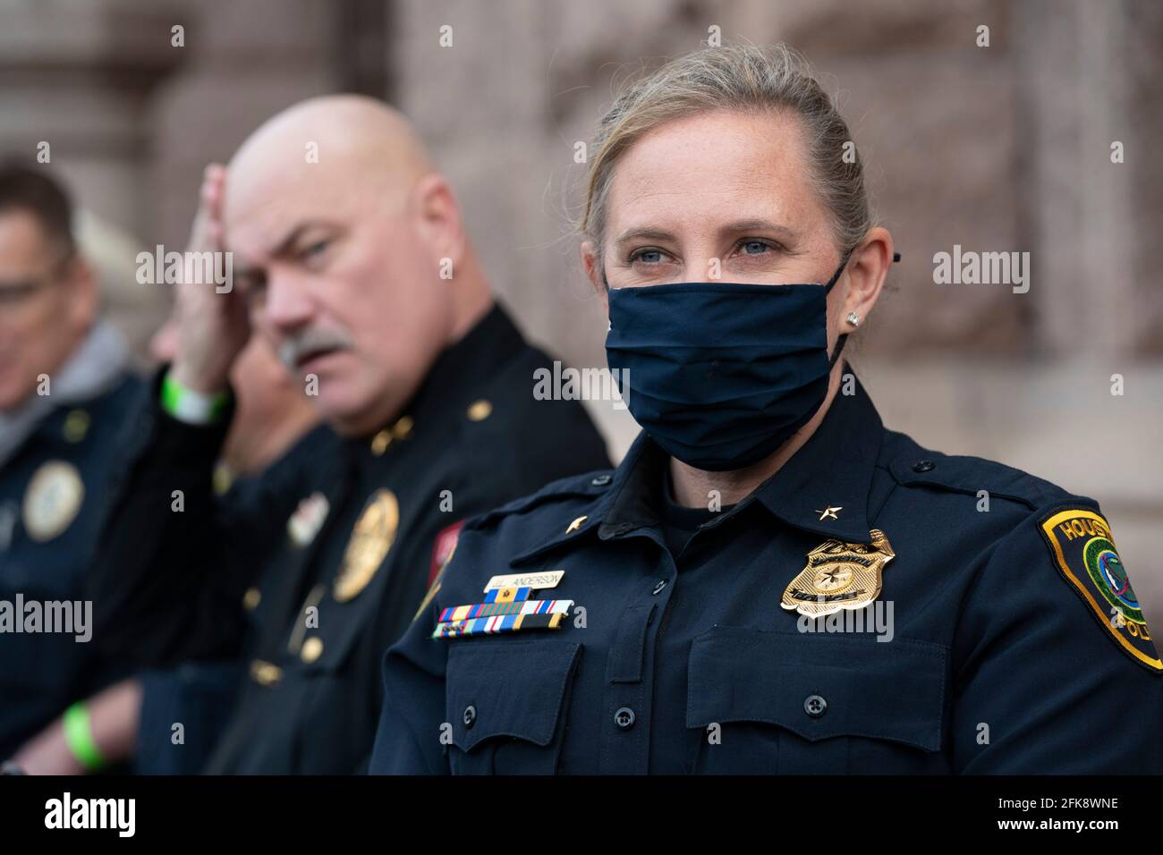 Police officers gun hi-res stock photography and images - Alamy