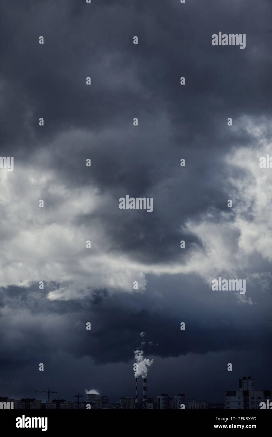 Heavy dark clouds covered building.There are air pollution under cloud ...