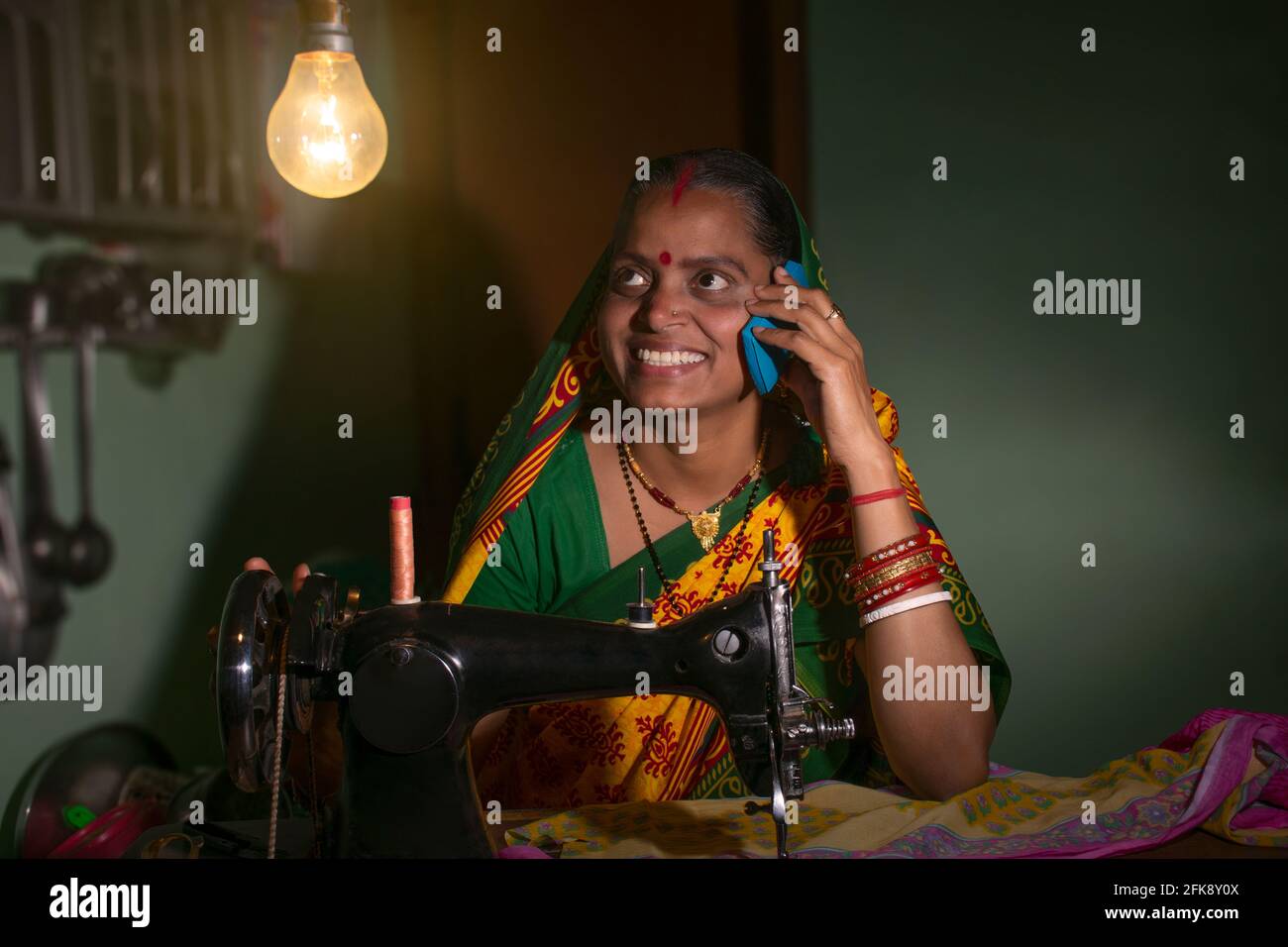 Indian woman using sewing machine hi-res stock photography and images ...
