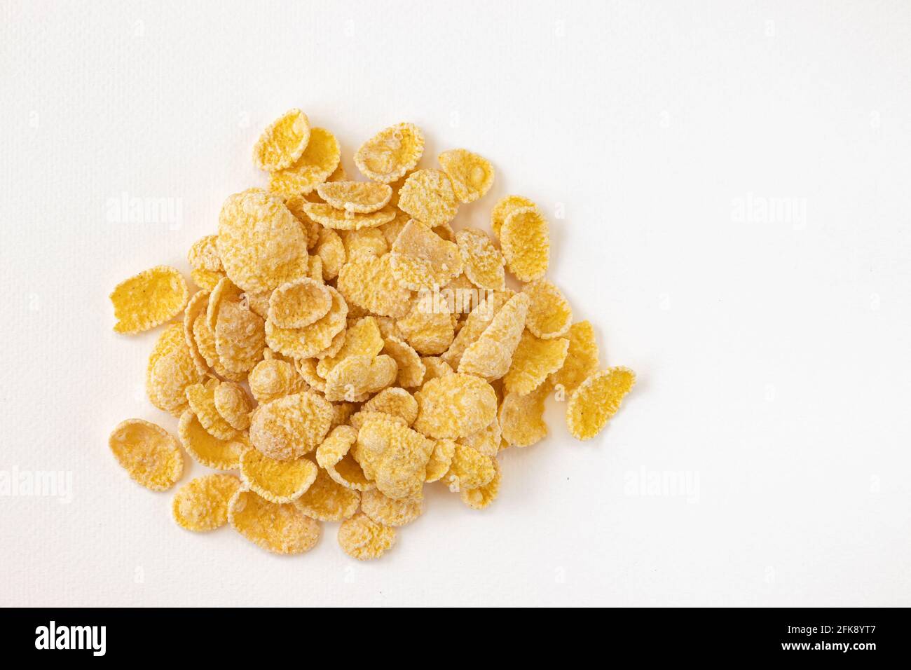 corn flakes isolated on white background, food ingredient, yellow corn ...