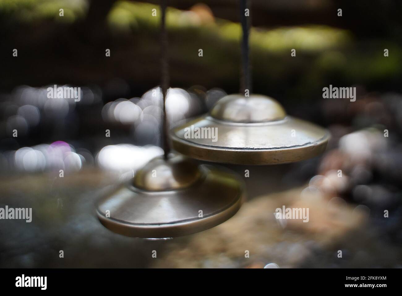 Cymbals close up for sound healing therapy Stock Photo - Alamy
