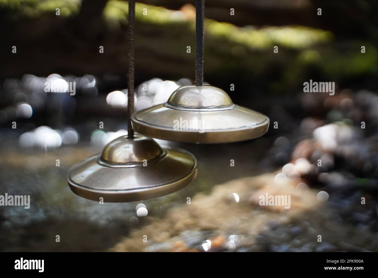 Cymbals close up for sound healing therapy Stock Photo - Alamy