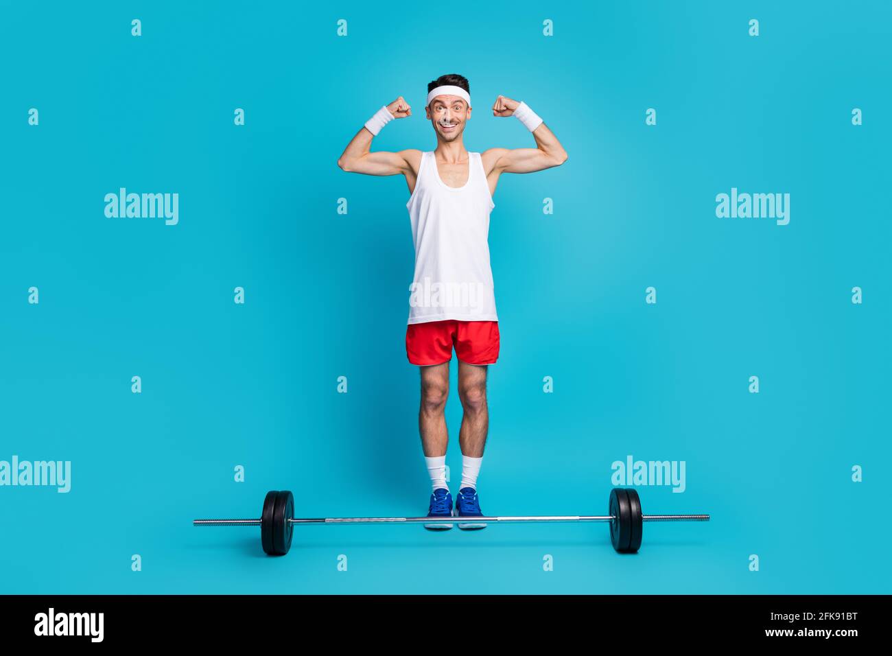 Full length photo of young man happy positive smile hold hands show ...