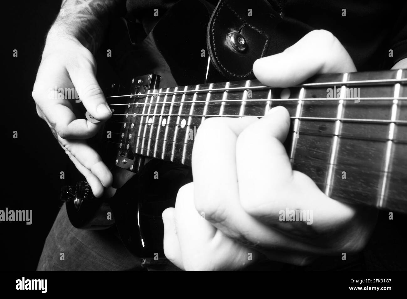 Hands Playing Guitar
