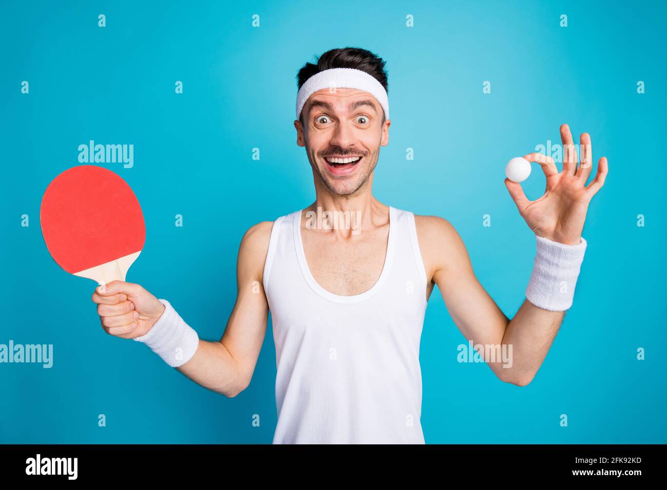 Photo of young man excited happy smile play table tennis ball raquete ...