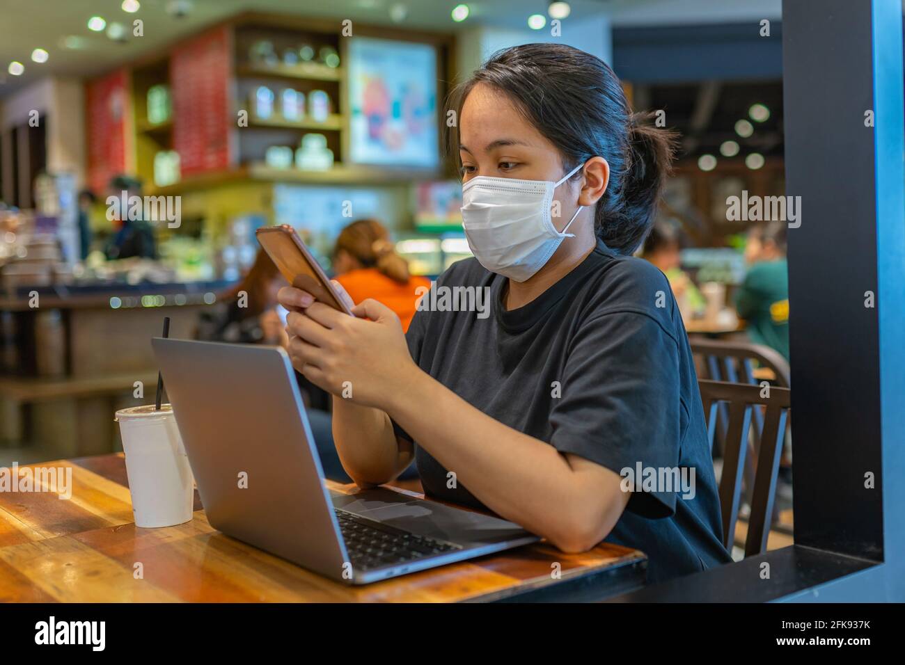 Woman wearing protective mask to prevent Covid-19 infection Stock Photo ...