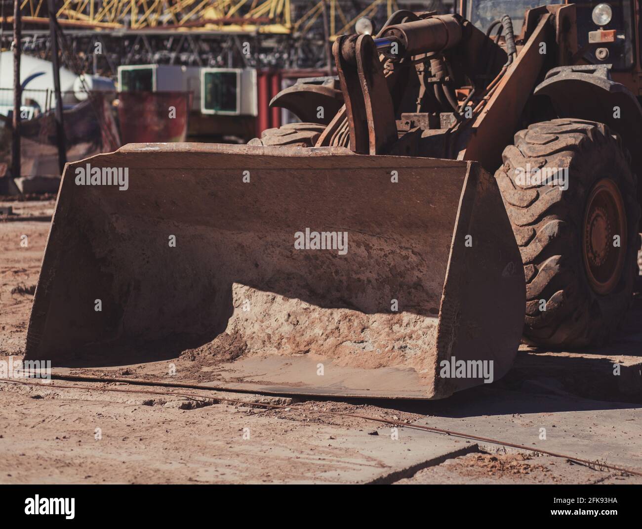Wheel loader with a large bucket on the construction site ...