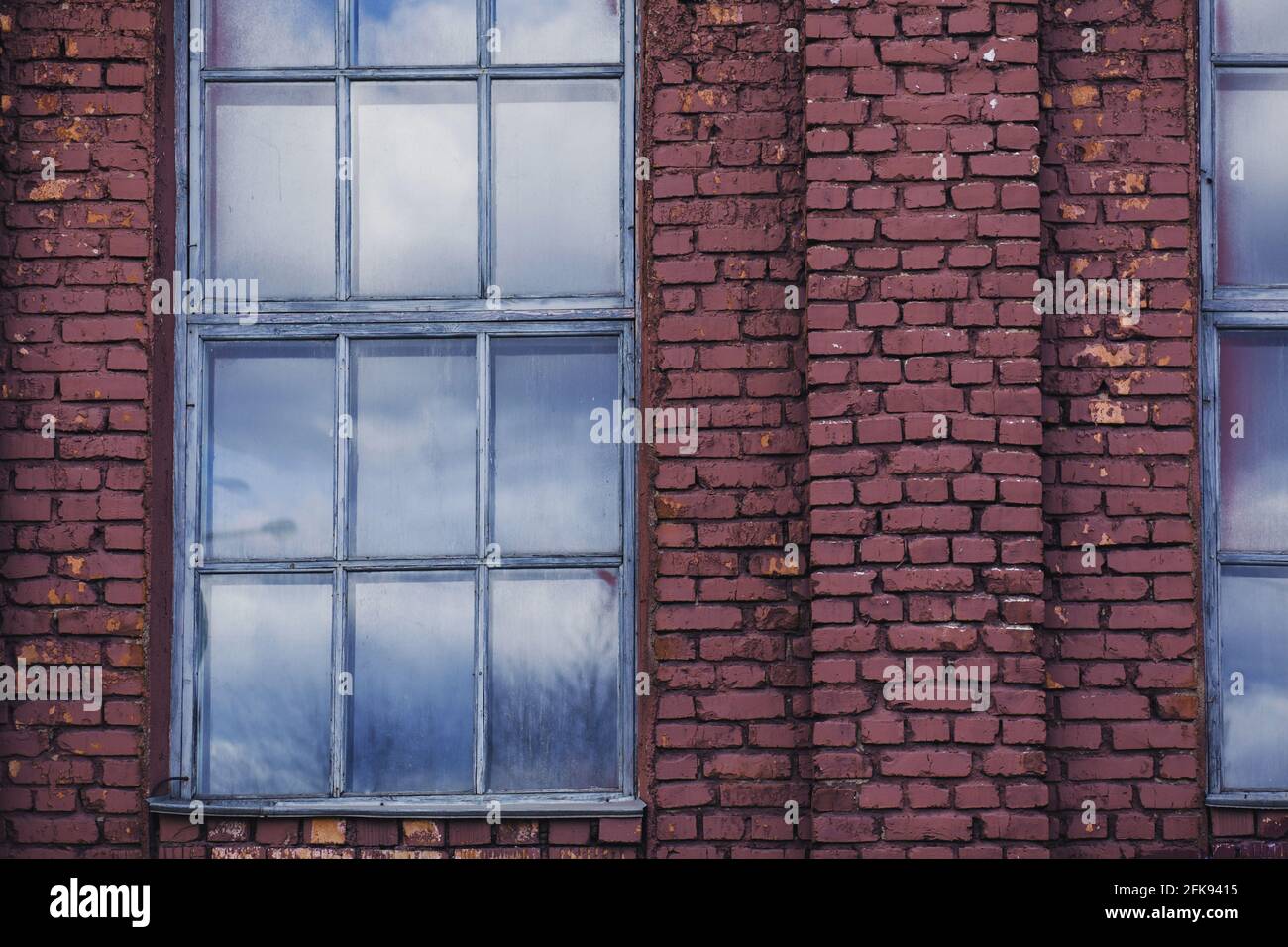 old brick building with large windows in Europe. old architecture Stock ...