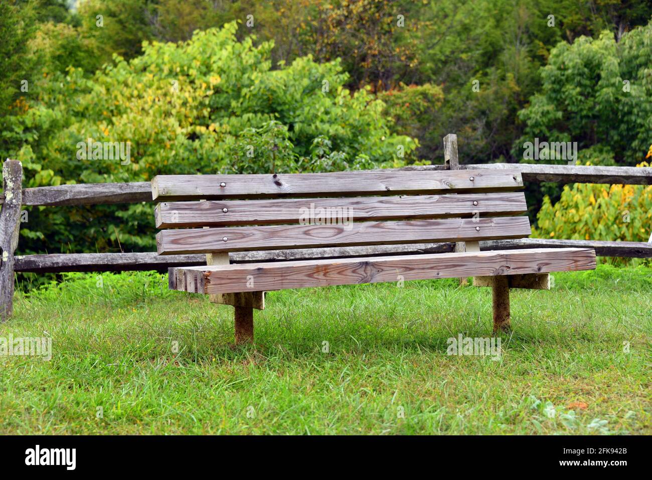 Lonely wooden bench sits in Bays Mountain State Park. Rustic, wooden ...