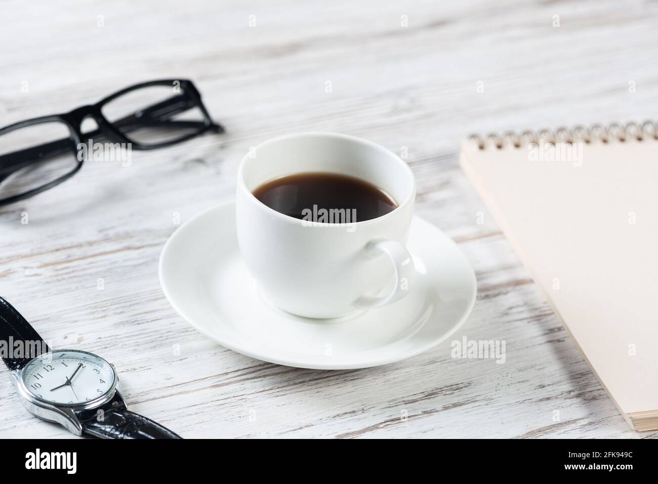 Top view office desk with white cup of coffee Stock Photo - Alamy
