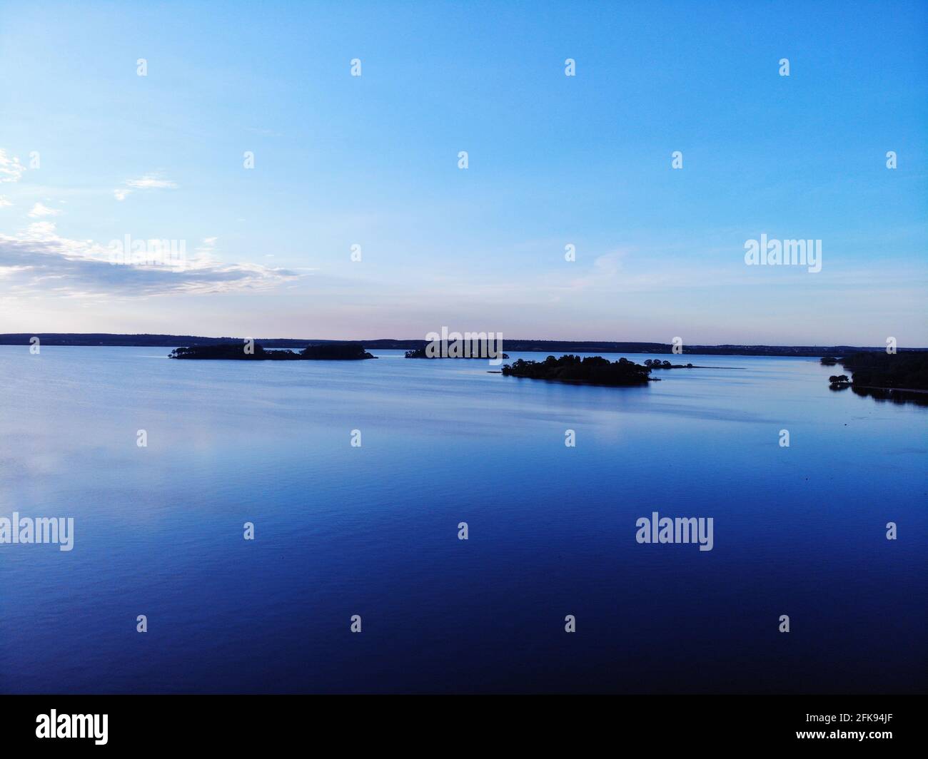 Sunset sky over lake hi-res stock photography and images - Alamy