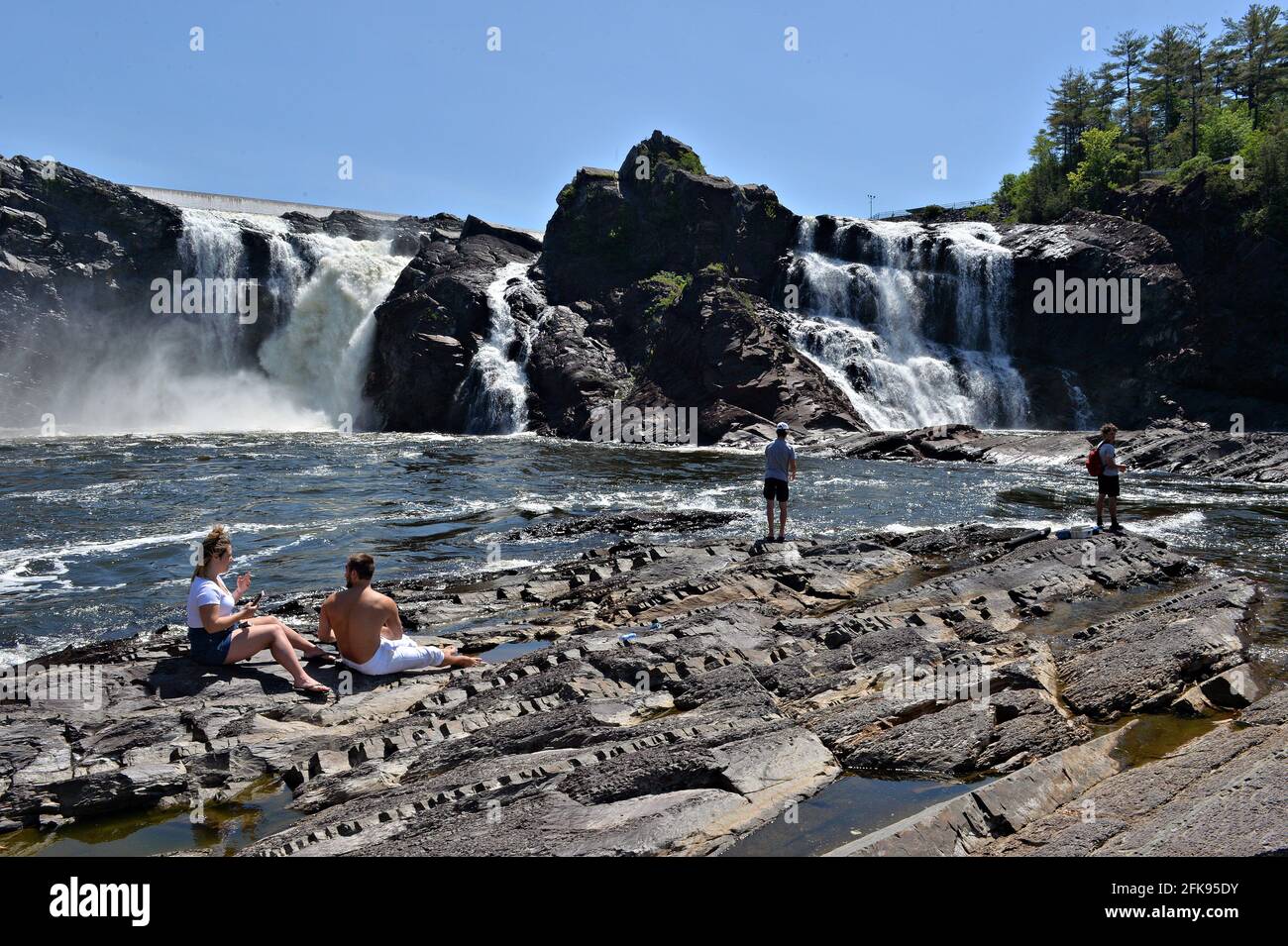 people enjoying summertime at Chutes de Charny in Lévis, Canada Stock ...