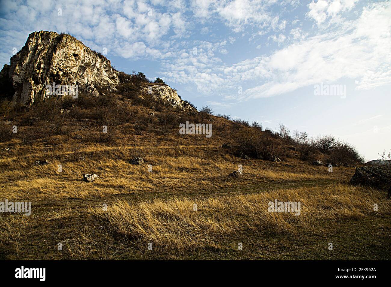 View of the rock. Rock lit the evening sun Stock Photo - Alamy