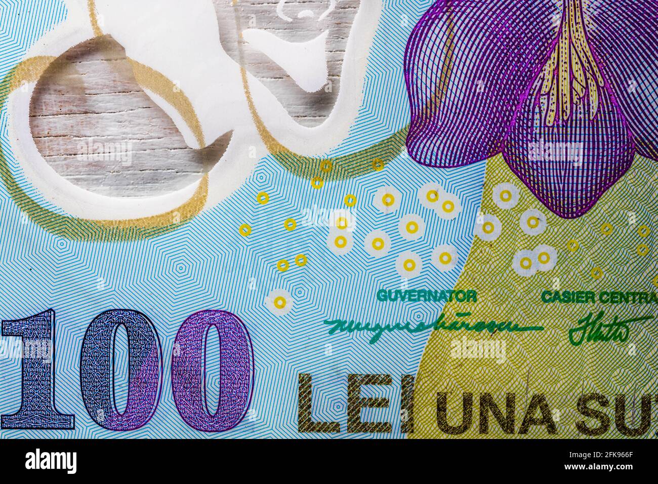 Selective focus on detail of LEI banknotes. Close up macro detail of ...