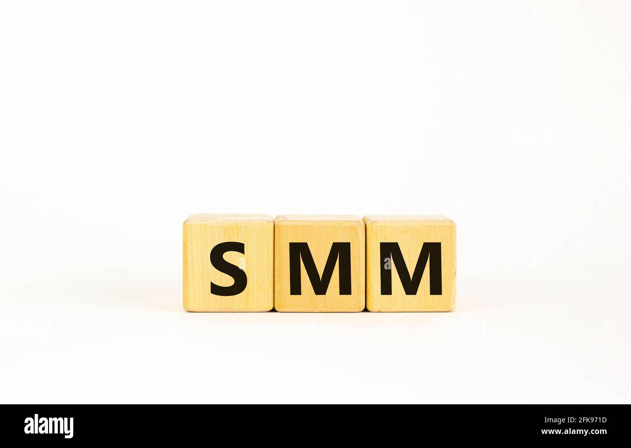 SMM, social media marketing symbol. Wooden cubes with word 'SMM ...