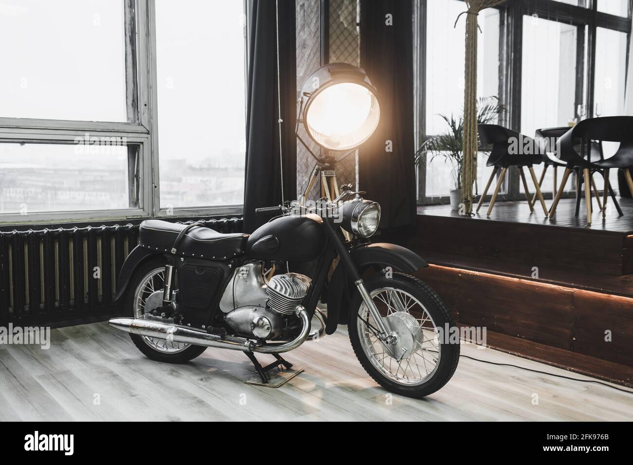 classic retro motorcycle in the garage or workshop. vintage bike Stock ...