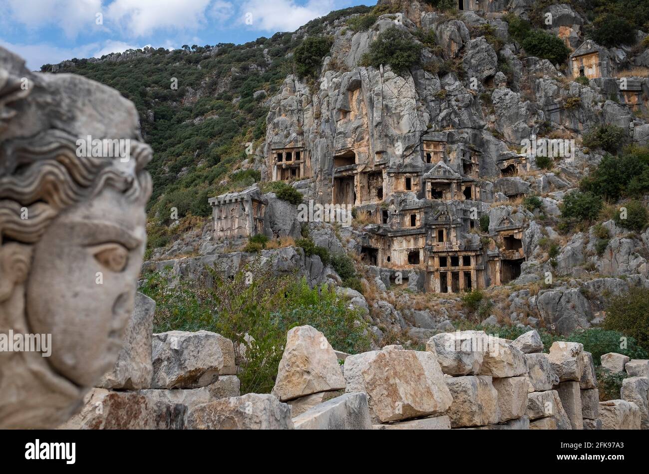 Ancient lycian Myra tombs and woman's stone face in Turkey, Demre Stock ...