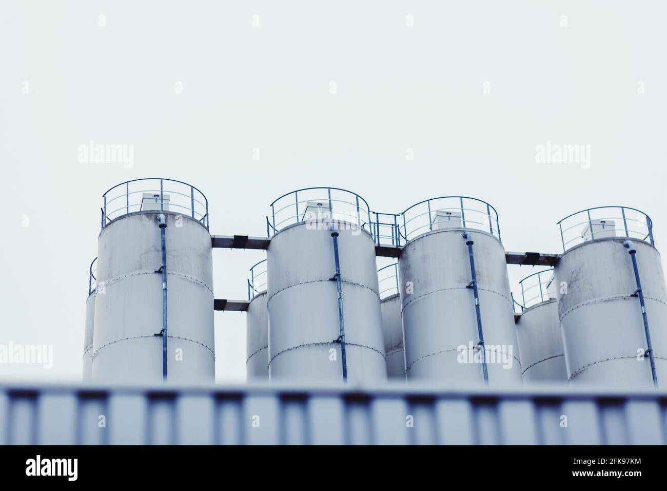 Industrial factory building. metal pipes of the plant Stock Photo - Alamy