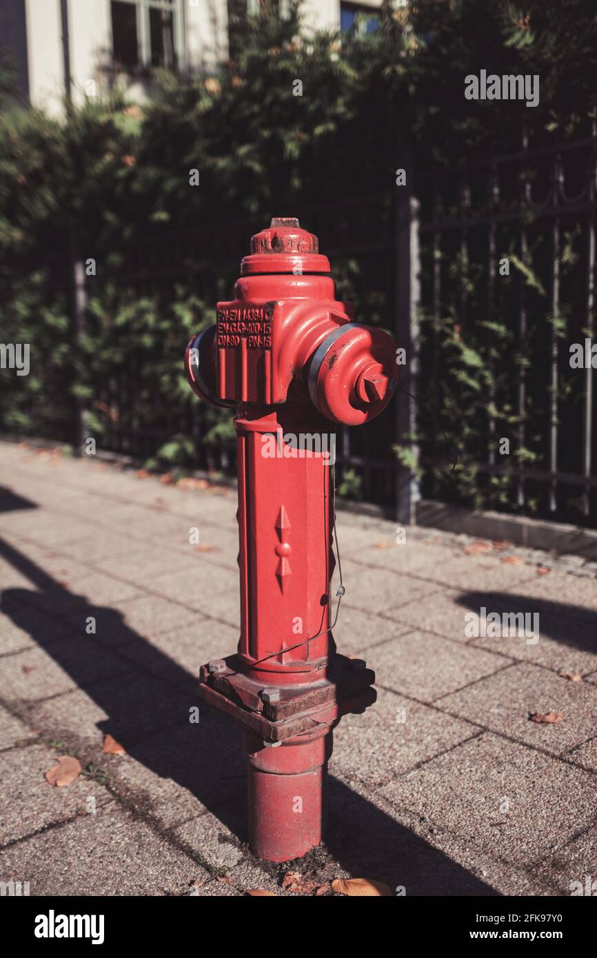 red fire hydrant in the city. fire safety Stock Photo - Alamy