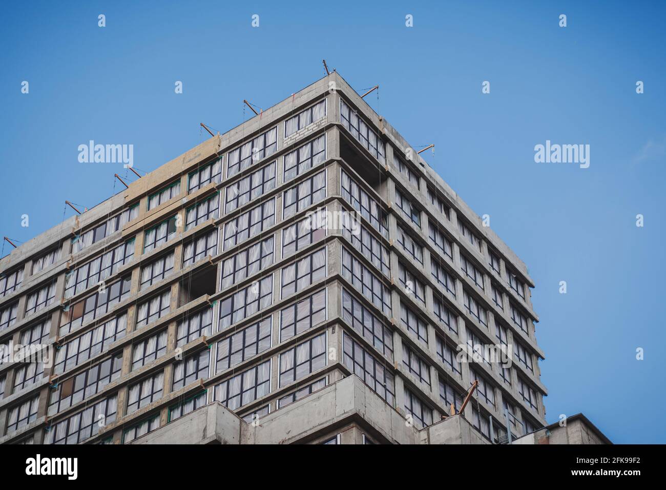 high- rise building under construction of concrete with windows Stock ...