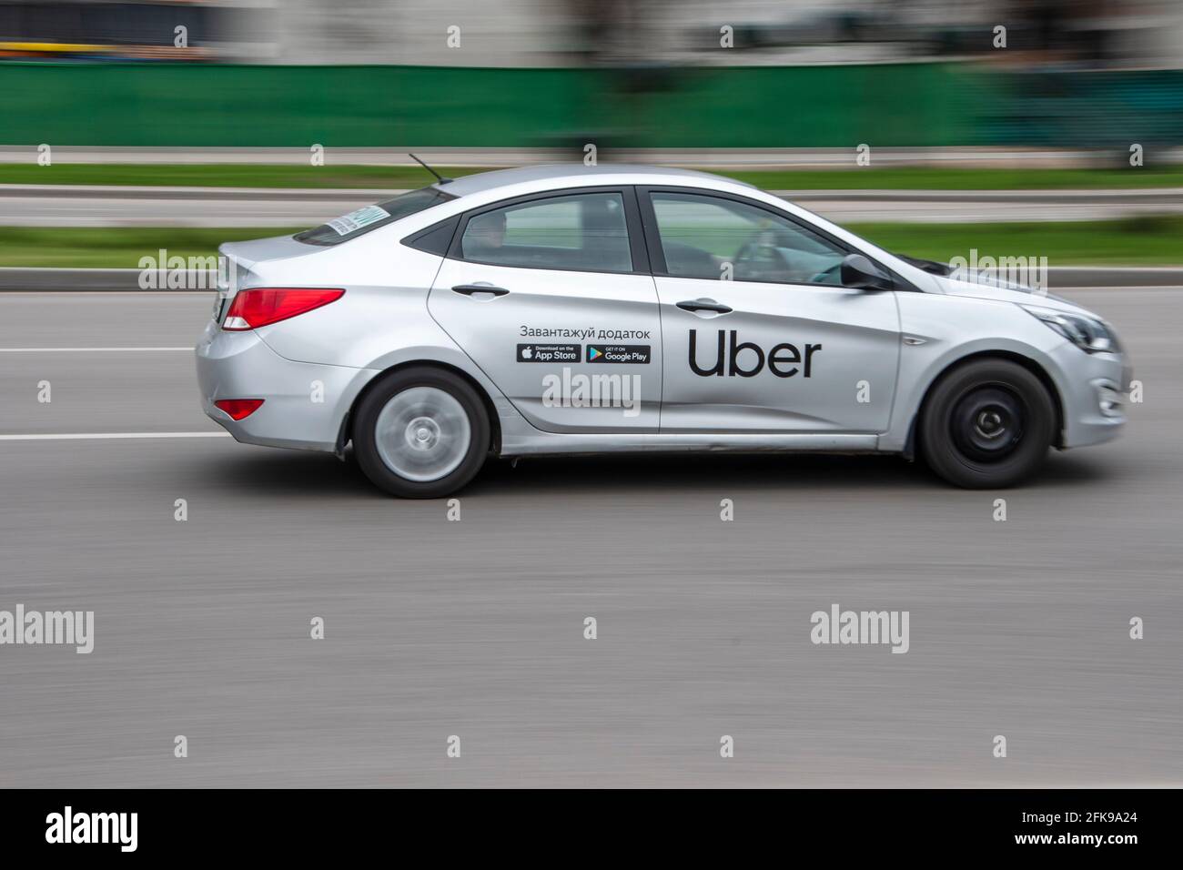Ukraine, Kyiv - 20 April 2021: White Hyundai Solaris car moving on the ...