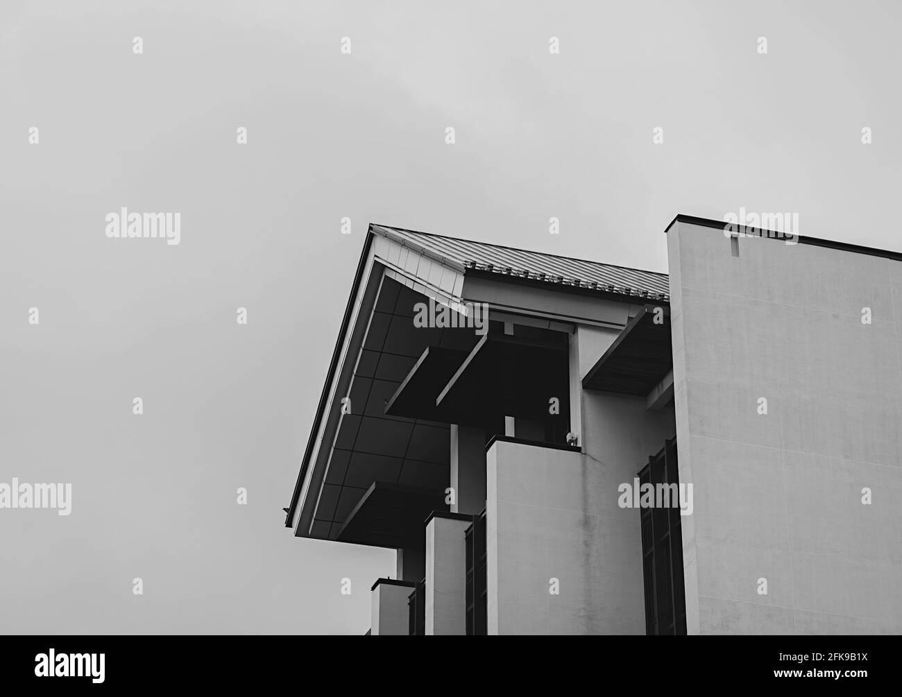 roof and facade of the hotel. black and white building Stock Photo - Alamy