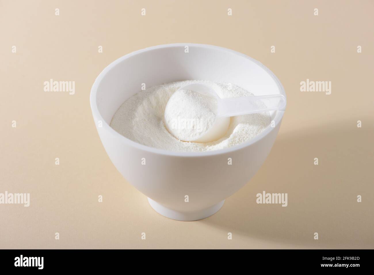 Collagen powder on beige background. Natural beauty and health ...