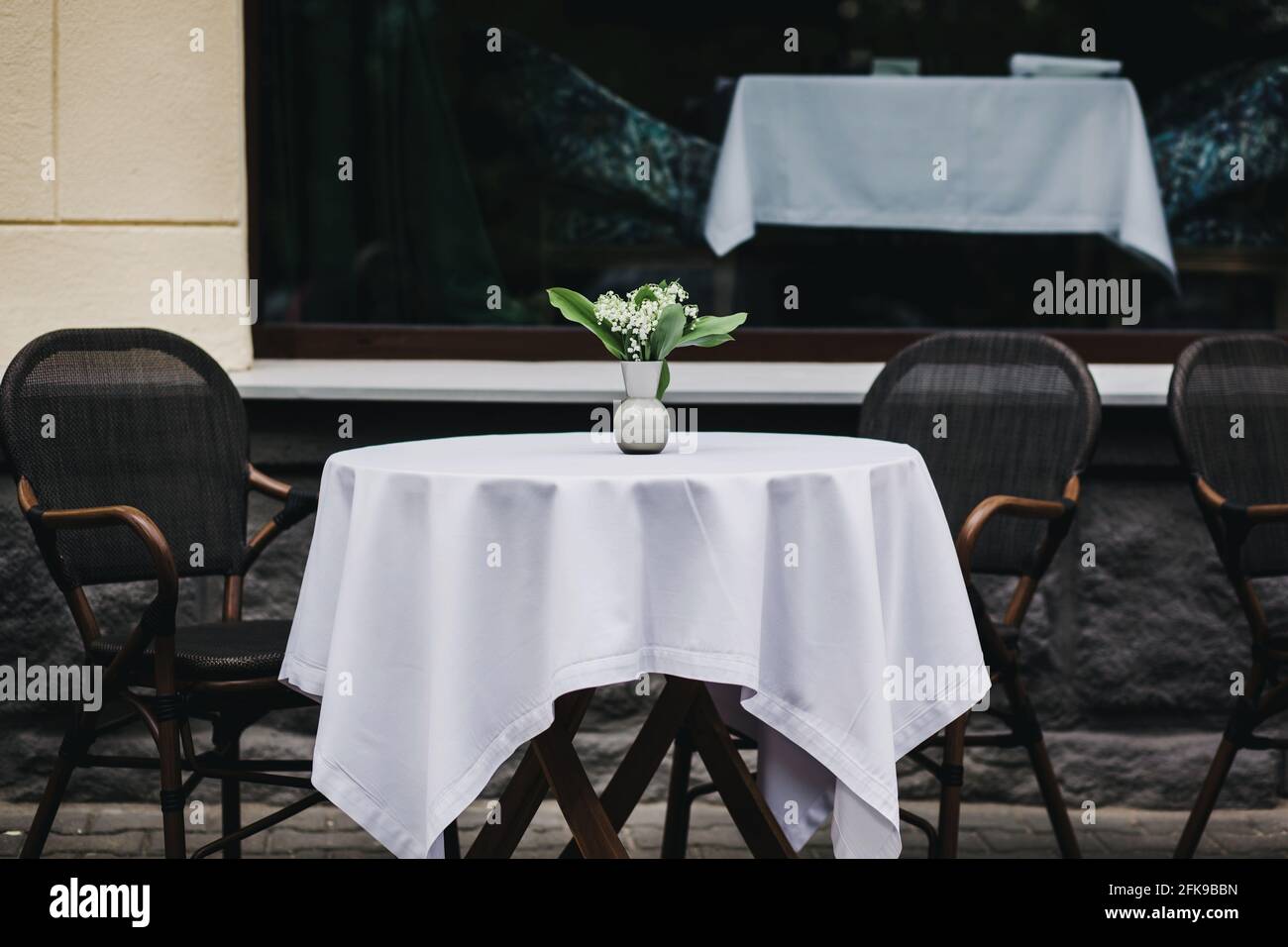 romantic place in the city. street cozy cafe with tables Stock Photo ...